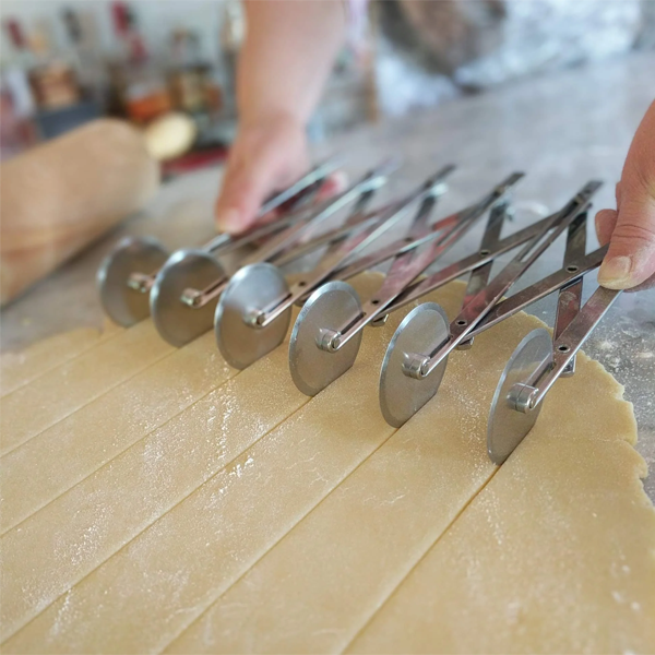 Stainless Steel Double Sided Wheel Dough Cutter – Bakeware.pk